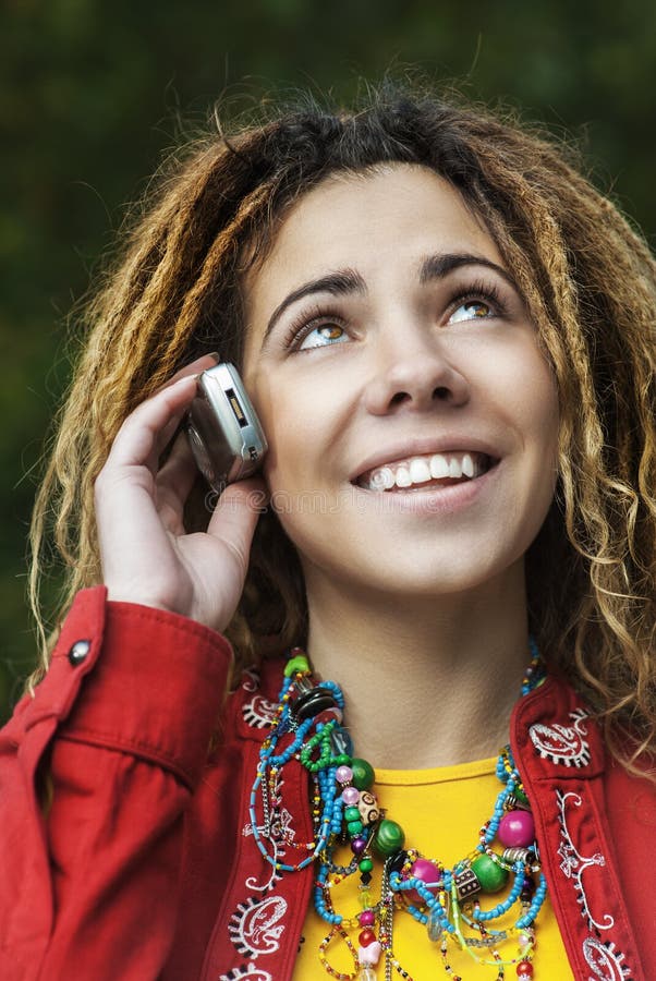 Woman with Dreadlocks Talking on Phone Stock Photo - Image of close ...