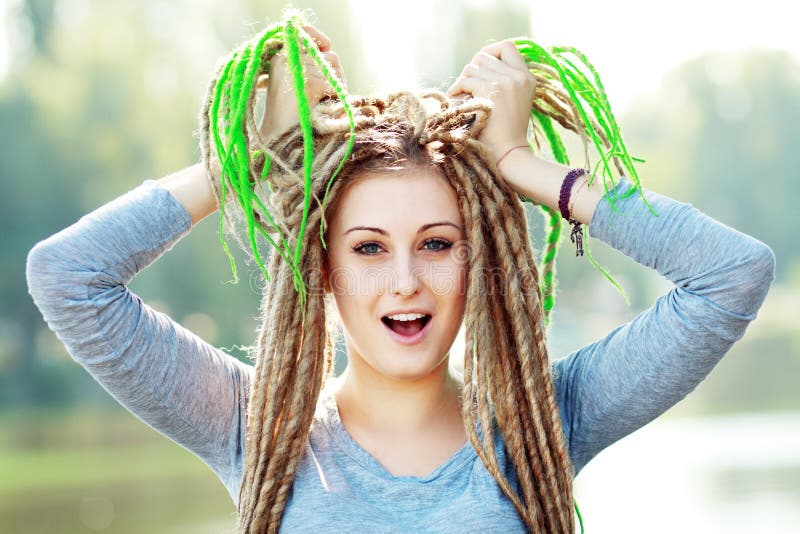 Woman with Dreads Making Face Stock Photo - Image of adornment, blue ...