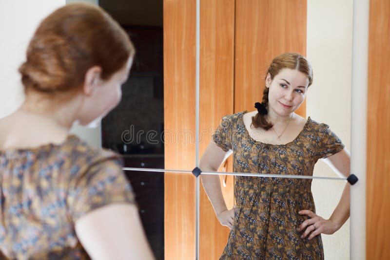 Woman in Dress Standing Against Mirror Stock Image - Image of fashion ...