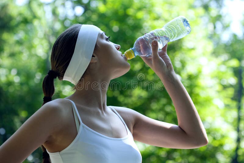 Woman drink water stock photo. Image of health, shaping - 20101024