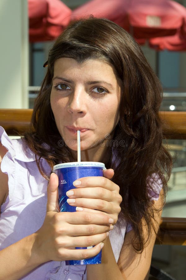 Woman drinking stock photo. Image of pepsi, brunette, drink - 2858278