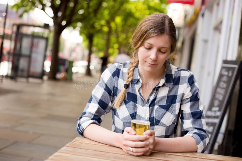 Woman drinking alone stock photo. Image of contemplating - 55283444