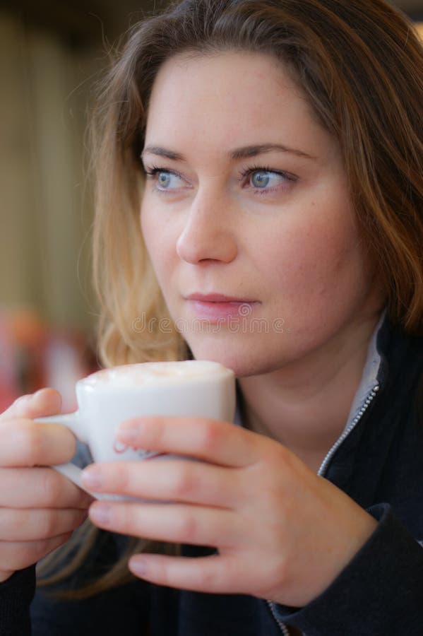 Woman Relaxing on Sofa at Home Drinking Coffee Stock Photo - Image of ...