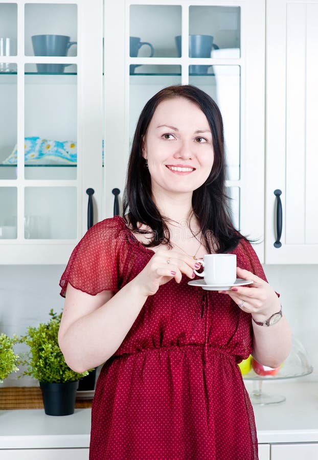 Woman Drinking Coffee in the Kitchen Stock Photo - Image of comfort ...