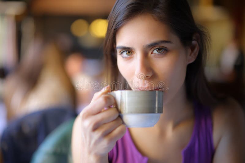 Woman Drinking Coffee Looking at You in a Shop Stock Image - Image of ...