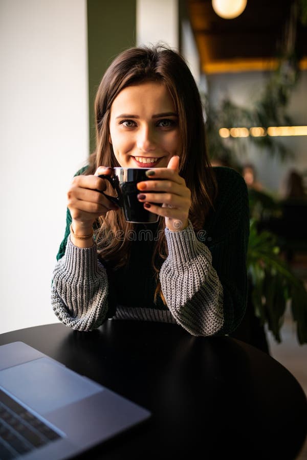 Young Woman Drinking Coffee in the Morning at Cafe Stock Image - Image ...