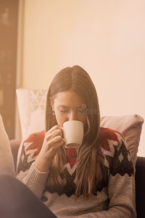 Woman Drinking Coffee from a Mug at Home Stock Photo - Image of ...