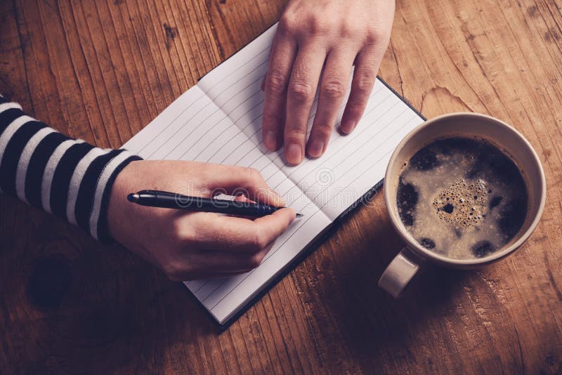 Woman Drinking Coffee and Writing a Diary Note Stock Photo - Image of ...