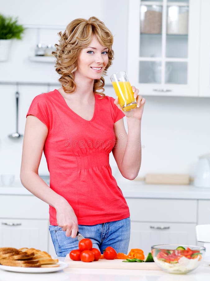 Woman cooking healthy food stock photo. Image of preparing - 16490056