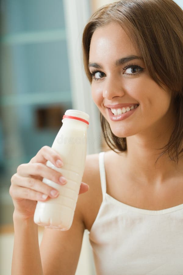 Woman drinking milk stock image. Image of drinking, home - 6587617