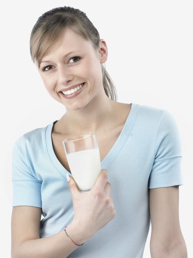 Woman drinking milk stock image. Image of female, pretty - 8299399
