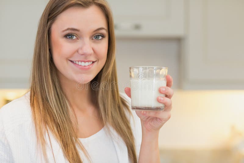 Woman drinking milk stock image. Image of breakfast, glass - 31098311