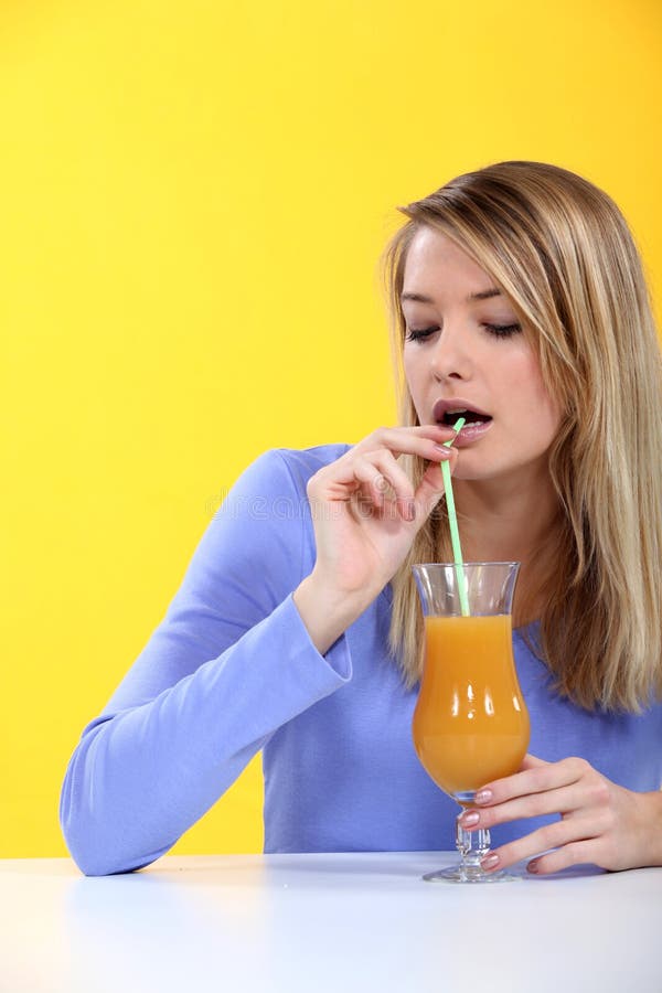 Woman Drinking Orange Juice Stock Photo - Image of juicy, fresh: 29641606