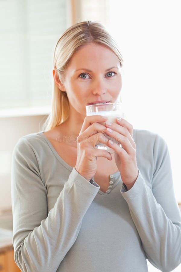 Woman drinking some water stock photo. Image of organic - 22218466