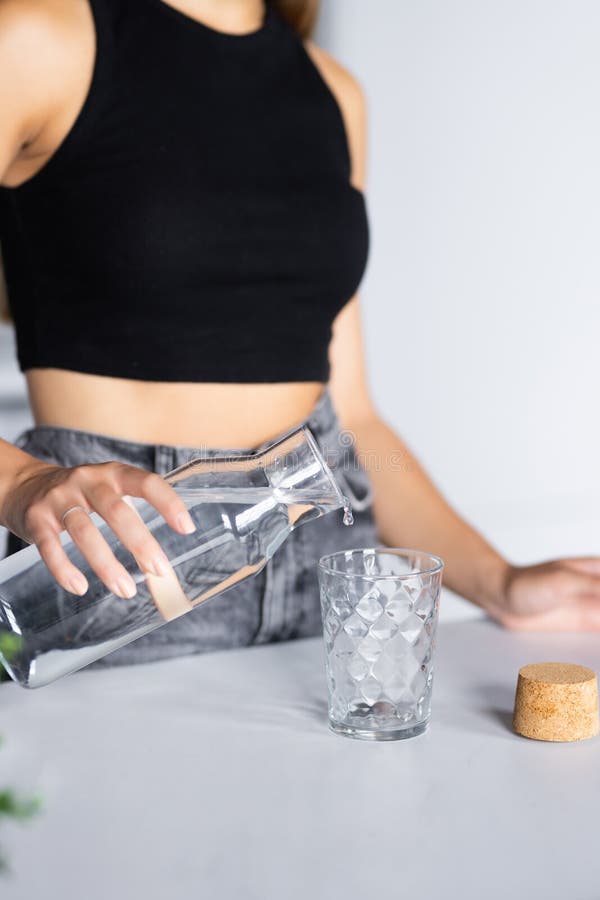 Young Woman Drinking Tap Water from Glass in Kitchen Stock Image ...