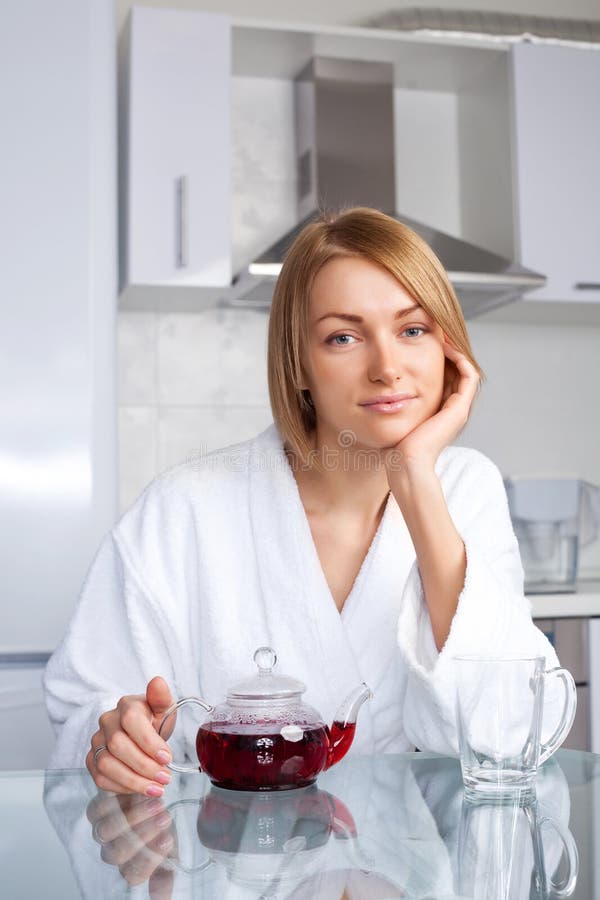 Woman drinking tea stock image. Image of interior, housewife - 16862677
