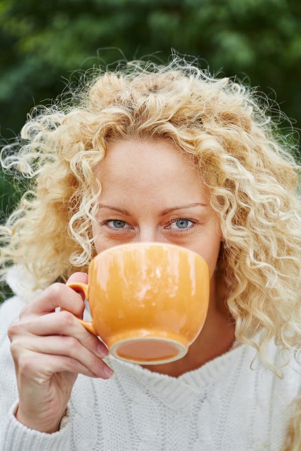 Woman Drinking Tea in Garden Stock Image - Image of garden, natural ...