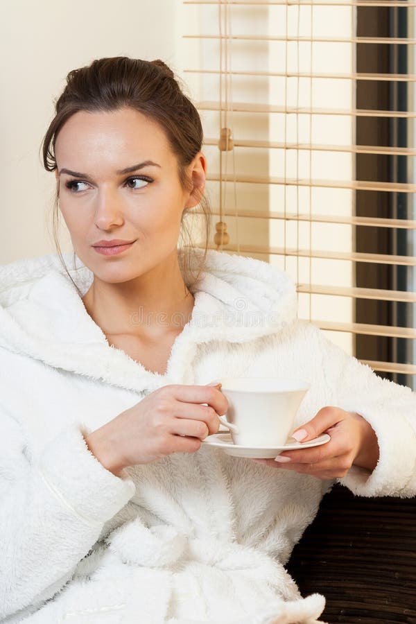 Woman Drinking Tea after Treatment Stock Photo - Image of bathrobe ...
