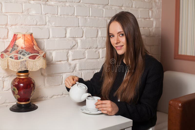 Woman drinking tea stock image. Image of beverage, drink - 66489755