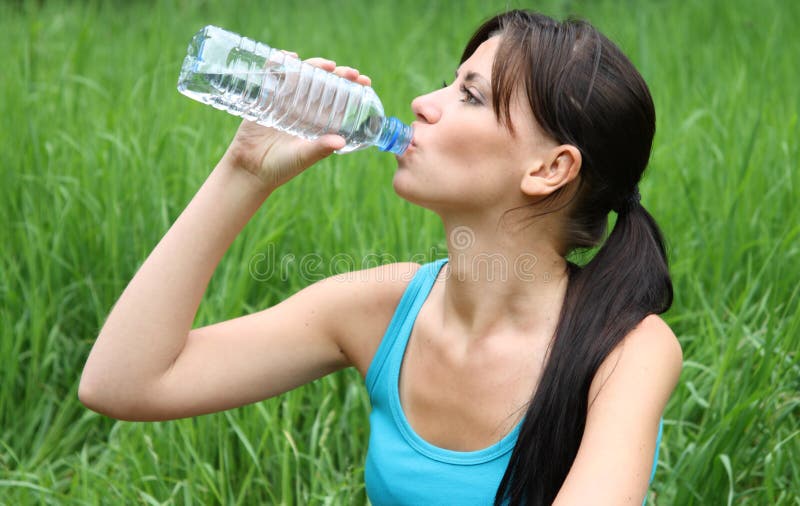 Woman drinking water stock image. Image of female, adult - 14616059