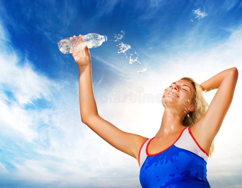 Woman drinking water stock image. Image of clouds, hydrate - 7690395
