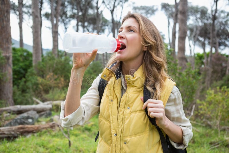 Woman Drinking Water while Doing a Break Stock Image - Image of ...