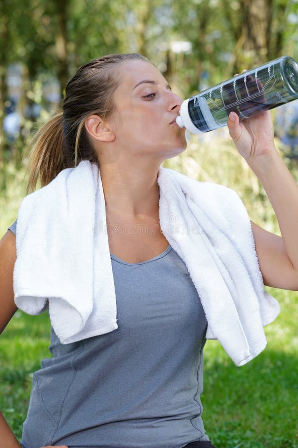 Woman Drinking Water in between Exercise Stock Image - Image of rest ...