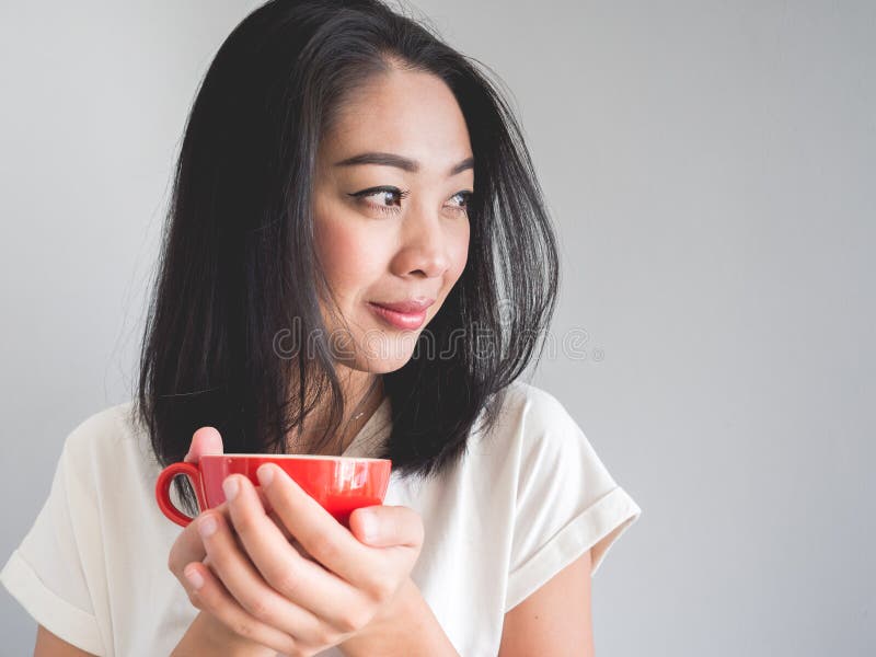 Woman drinks coffee. stock photo. Image of asian, beauty - 87799120
