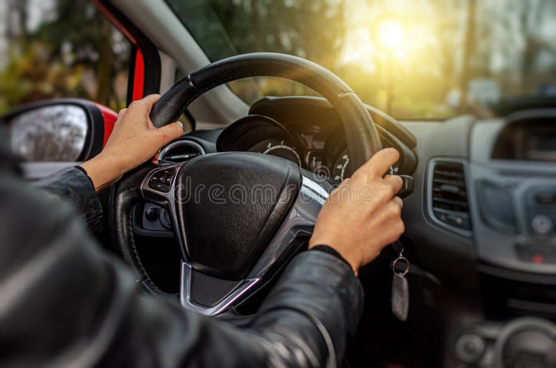 The Driver is Driving the Car on the Highway. View from the Cockpit ...