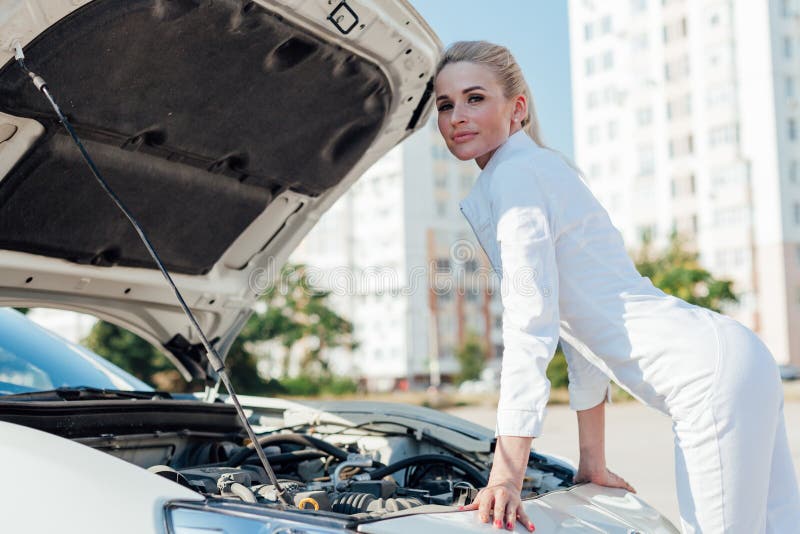 Woman Driver Mechanic Repairing Car Engine Stock Image - Image of ...