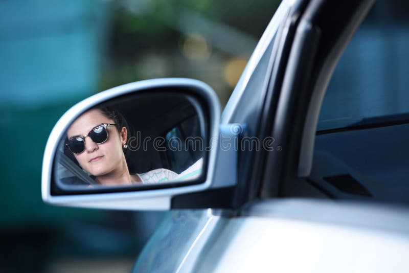 Woman driver in mirrow stock image. Image of happy, inside - 69538579