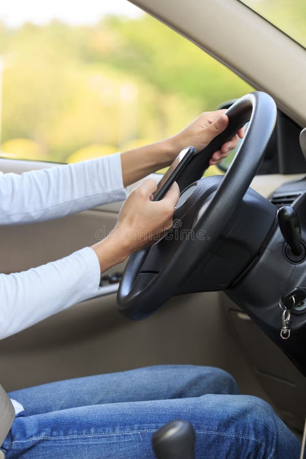 Driver Use Smartphone while Driving Car Stock Photo - Image of auto ...