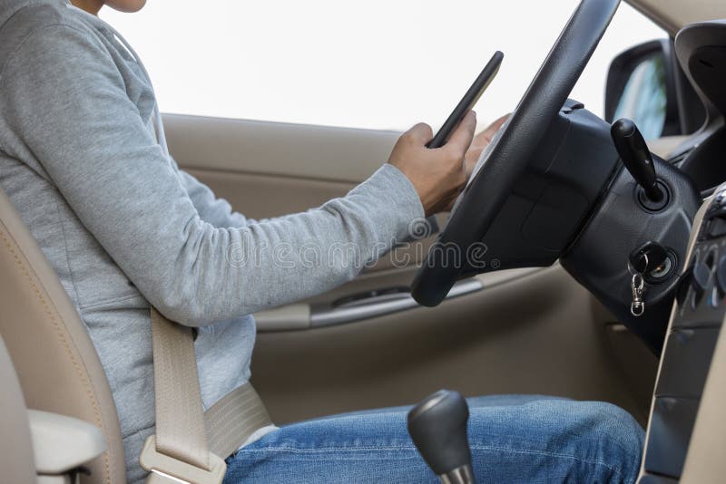 Driver Use Smartphone while Driving Car Stock Photo - Image of ...