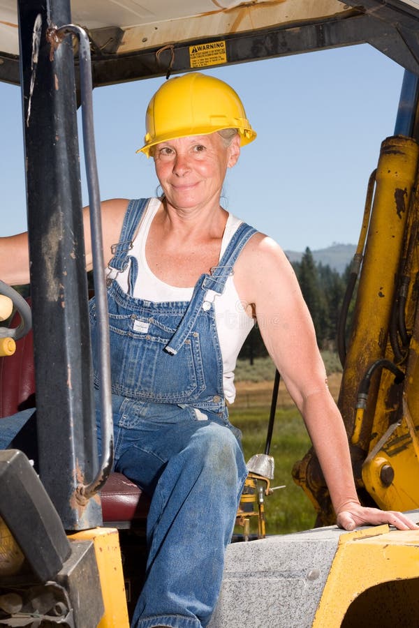 Woman driving backhoe stock photo. Image of earth, backhoe - 5801264