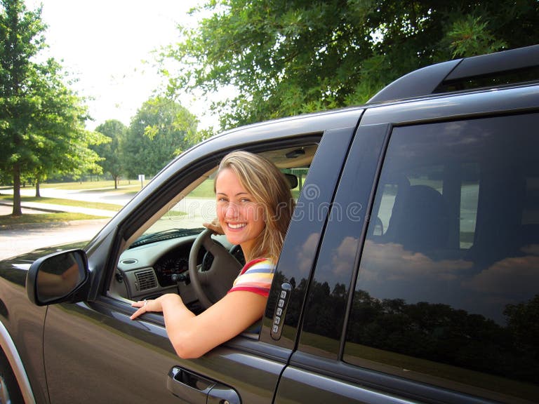 Woman Driving Car stock image. Image of minivan, speed - 1014023