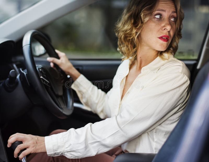 Woman Driving a Car in Reverse Stock Image - Image of reversing, drive ...