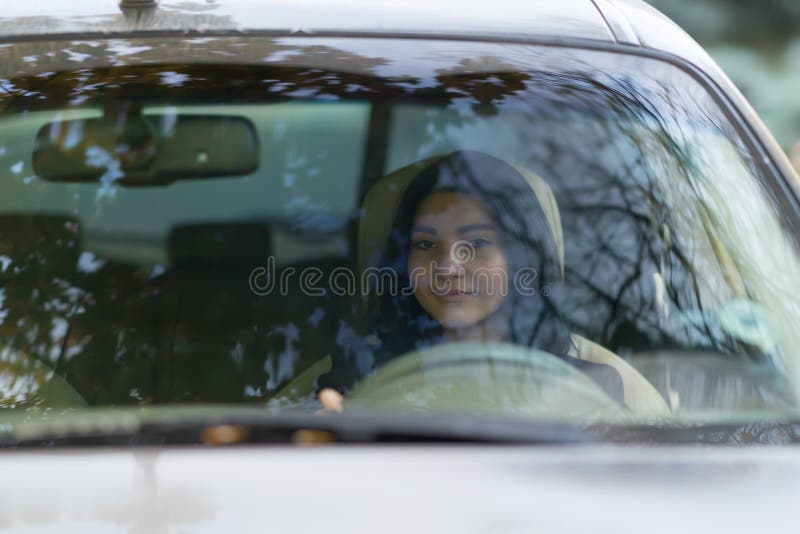 Woman Driving a Car Viewed through the Windscreen. Stock Image - Image ...