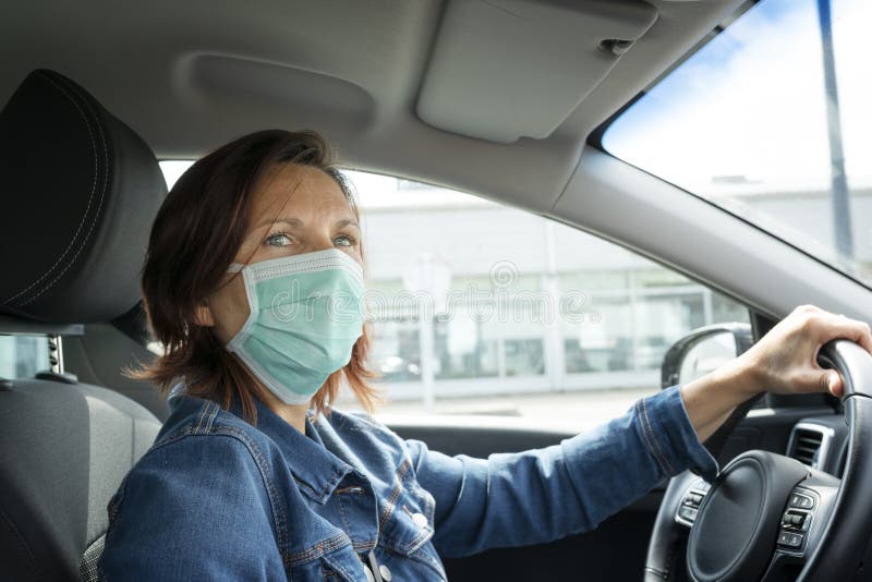 Woman Driving Her Car with a Mask Stock Photo - Image of covid19 ...