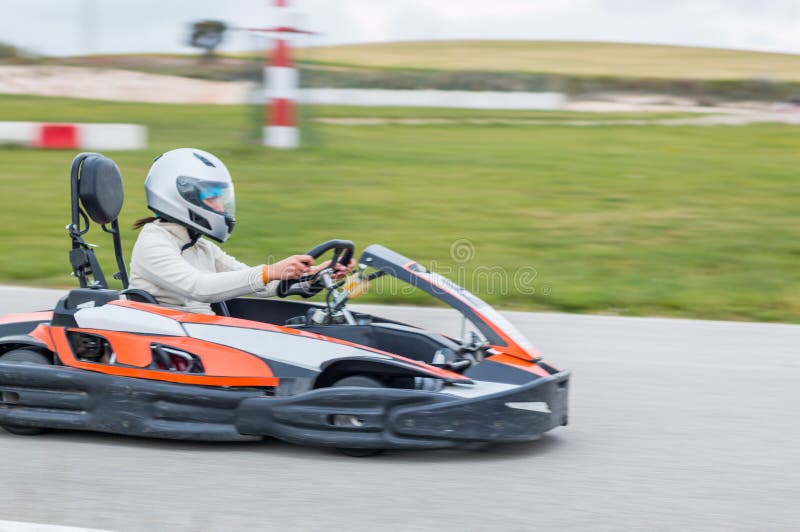 Woman driving a kart stock photo. Image of sport, driver - 56640260