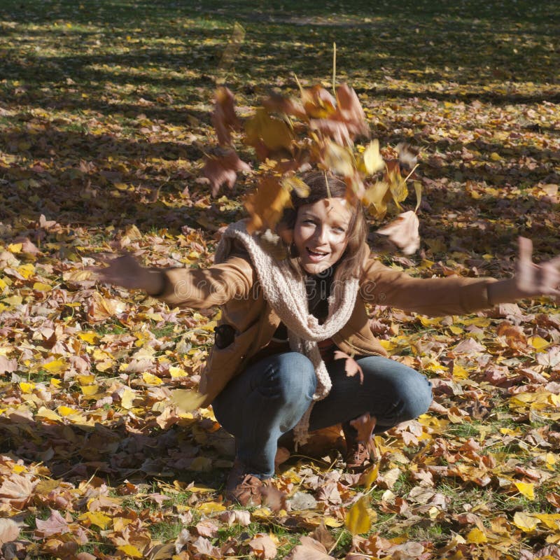 Woman Drop Leaves in Autumn Park Stock Image - Image of adult, laughing ...