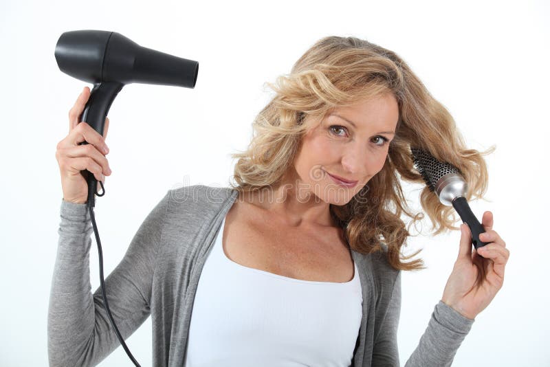 Woman drying hair stock image. Image of drying, shoulders - 29639263