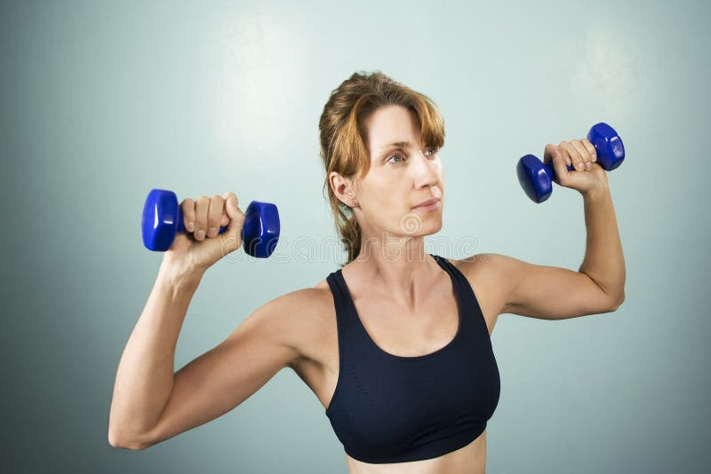 Woman with Dumbbells stock photo. Image of workout, body - 5859788