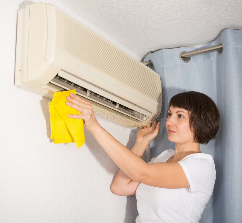 Woman Dusting Air Conditioning Stock Image - Image of plastic, cleaning ...