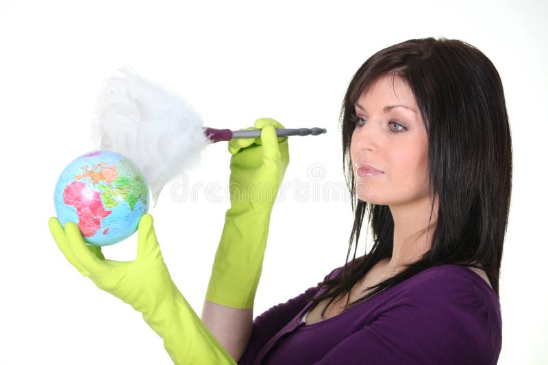 Woman dusting a globe stock image. Image of glove, cleaning - 37038937