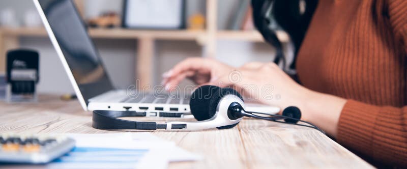 Woman with Earphone and Computer on Table Stock Image - Image of ...