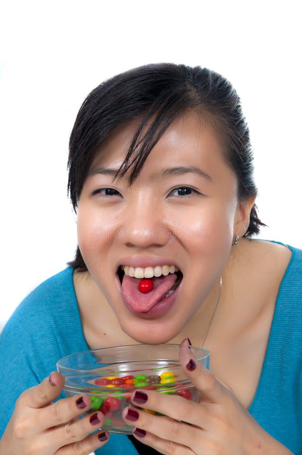 Woman Eat Candy stock photo. Image of sugar, girl, background - 16715446