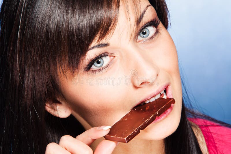 Woman eat chocolate bar stock image. Image of cocoa, delicious - 24318457