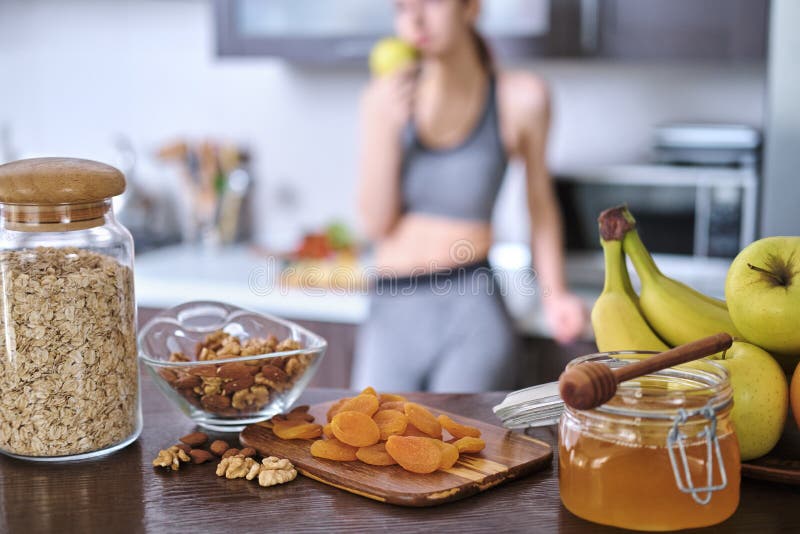 Woman is Eating an Apple after a Workout. Stock Image - Image of muscle ...