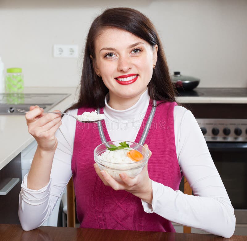 Woman eating boiled rice stock photo. Image of dieting - 41432136