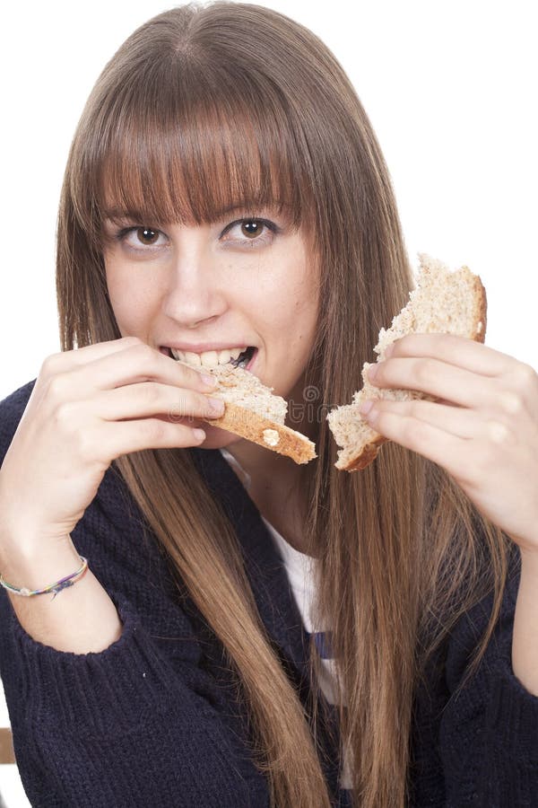 Woman eating bread stock photo. Image of cute, beautiful - 17831836
